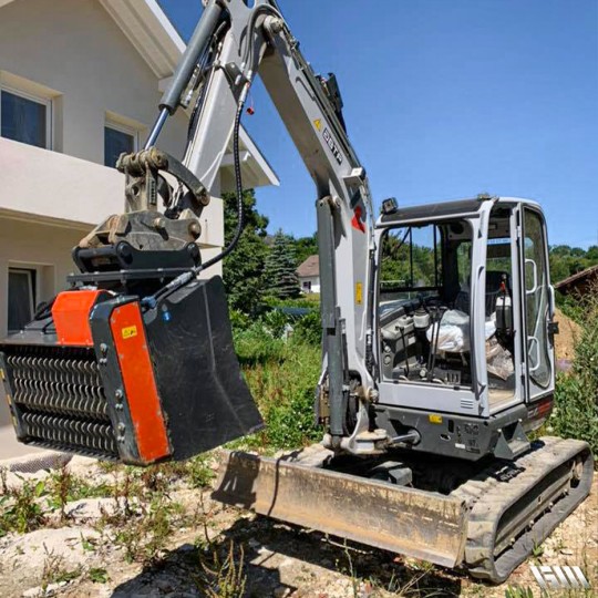 Godet cribleur à étoiles pour pelle hydraulique